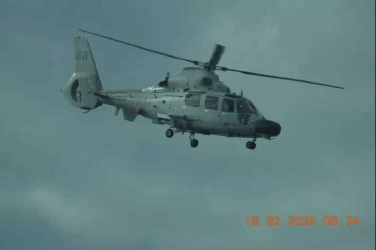 Chinese Navy Helicopter Comes Within 3 Meters of Philippine Patrol ...